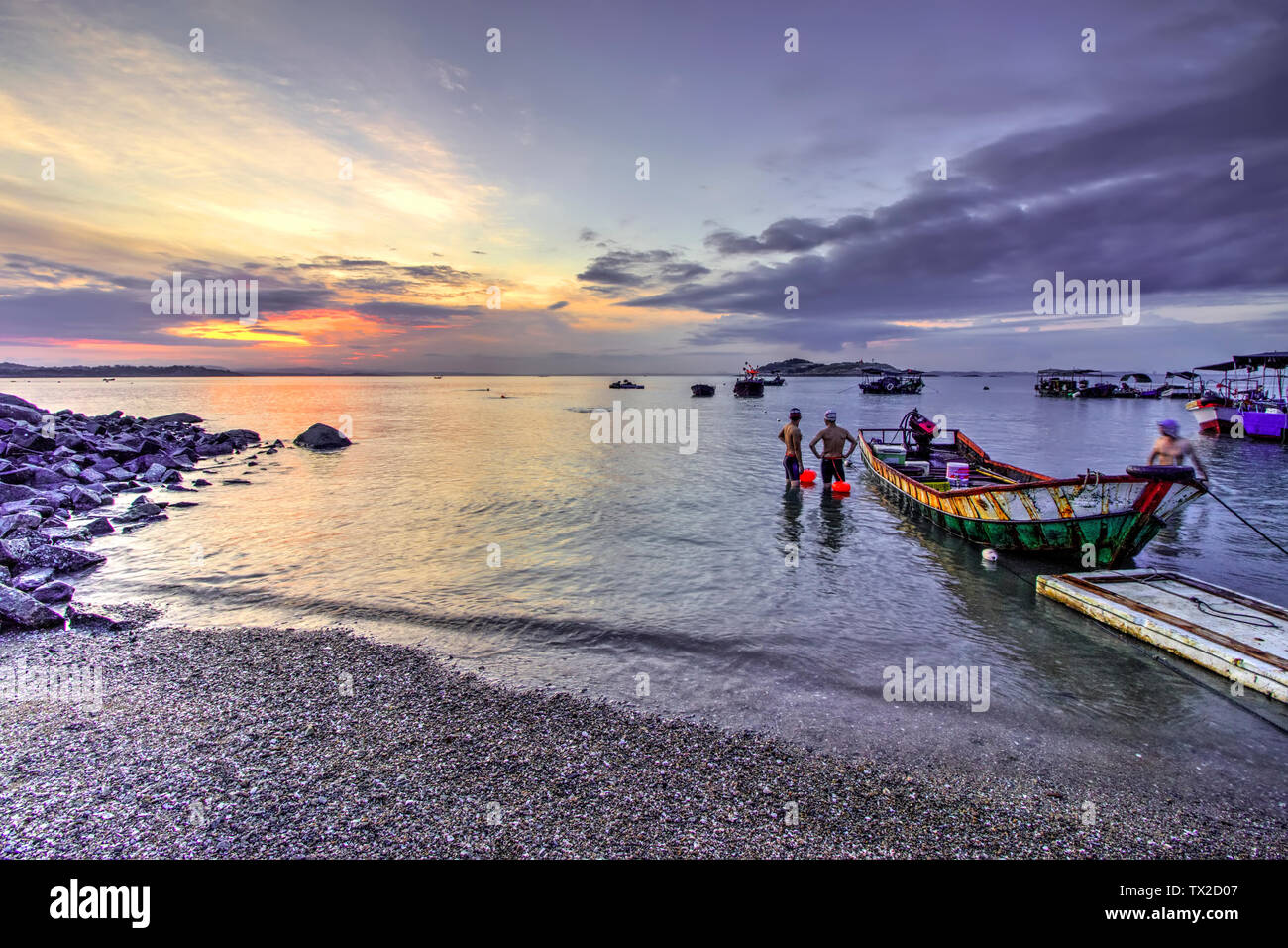 Chongwu Dayuan beach sunset Stock Photo - Alamy