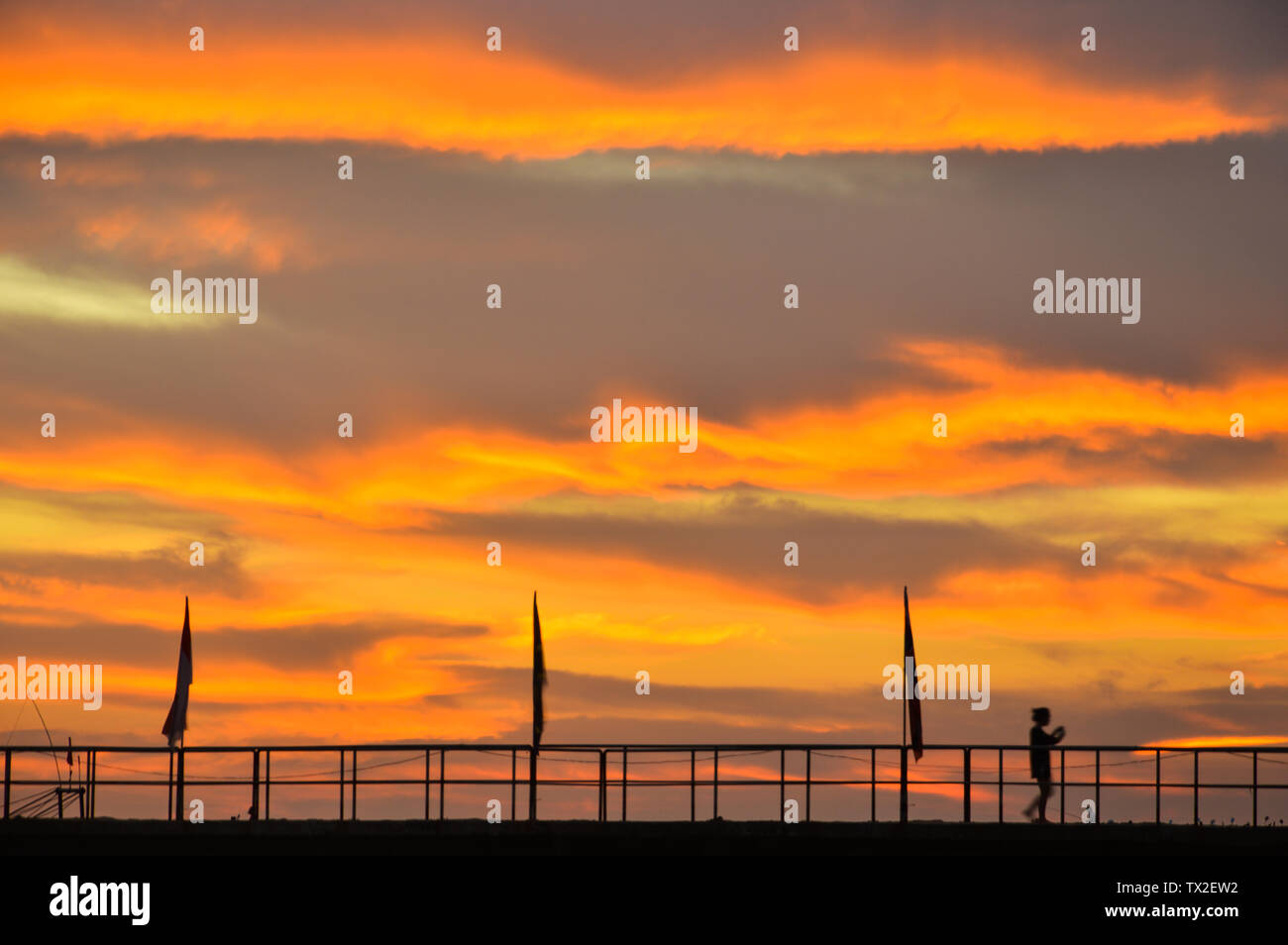 Silver beach sunset Stock Photo - Alamy