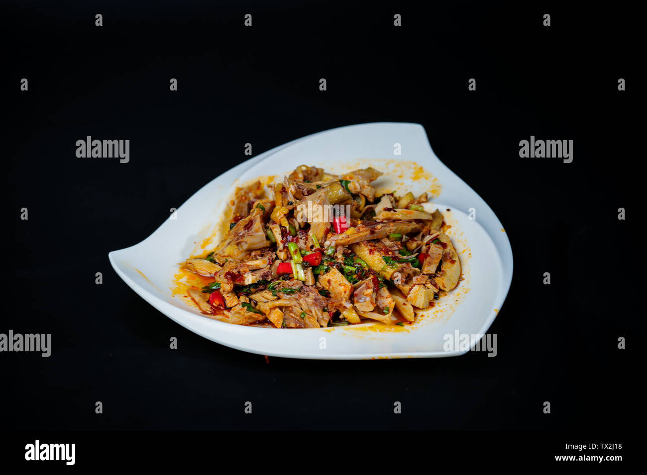 drooling chicken, stick chicken Stock Photo - Alamy