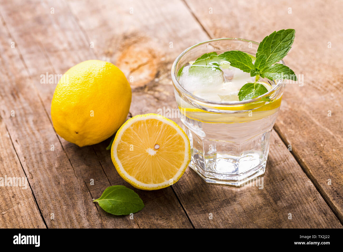 Lemonade, fresh lemonade and mint leaves, detox water Stock Photo - Alamy