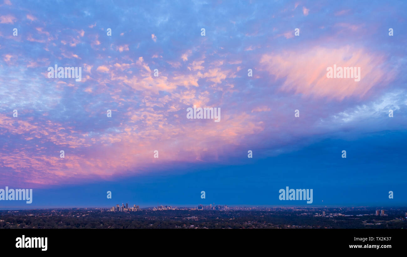 Soft pink sunset colors over the city of Sydney Australia. CBD skyline ...