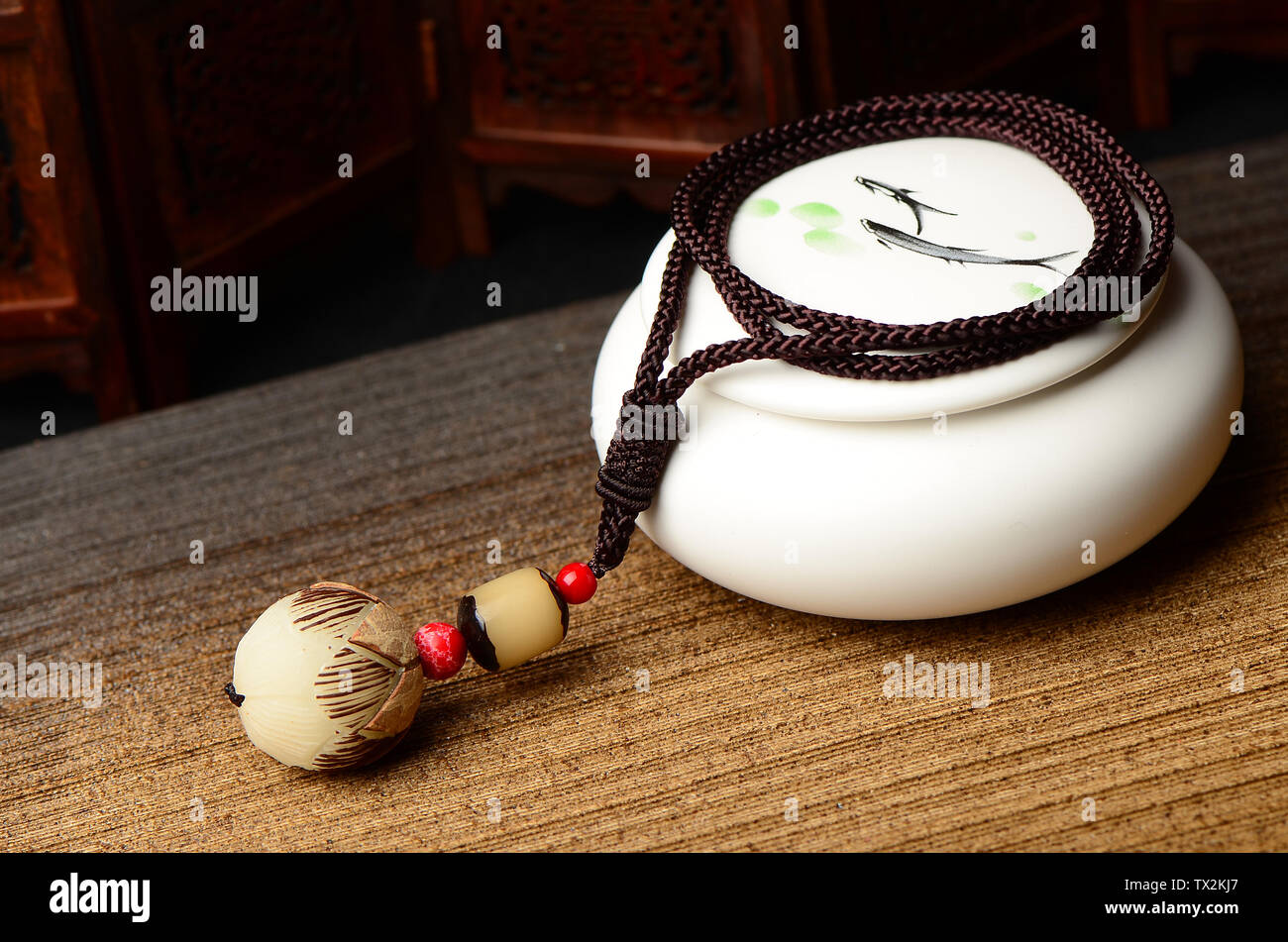 Bodhi pendant, necklace, wool chain Stock Photo - Alamy