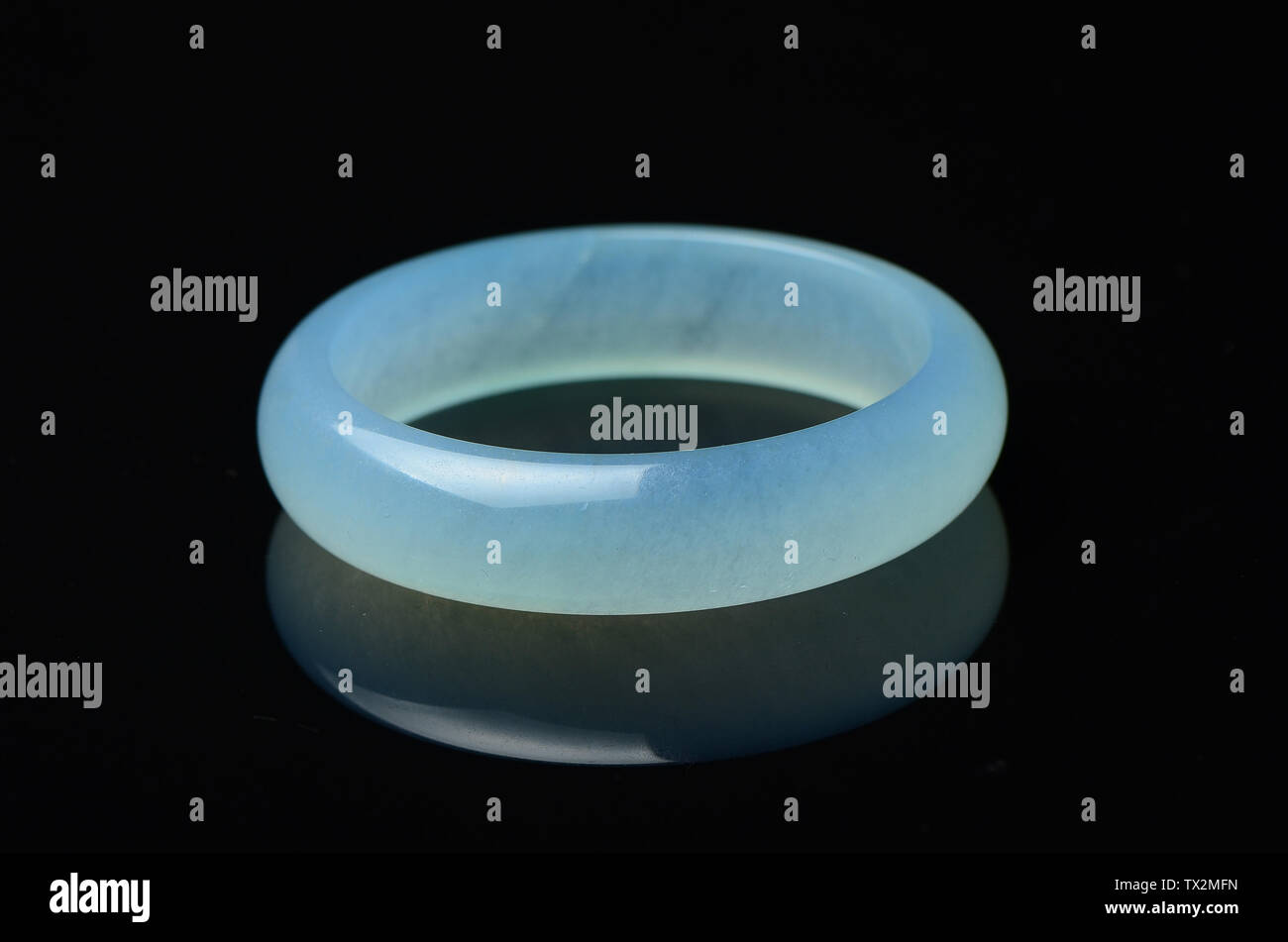 Still life picture of jade bracelet Stock Photo - Alamy