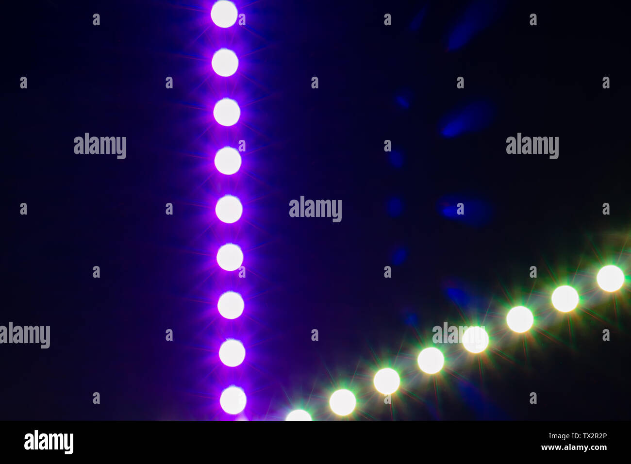 Abstract background of led strip lights and reflections on black. Retro ...