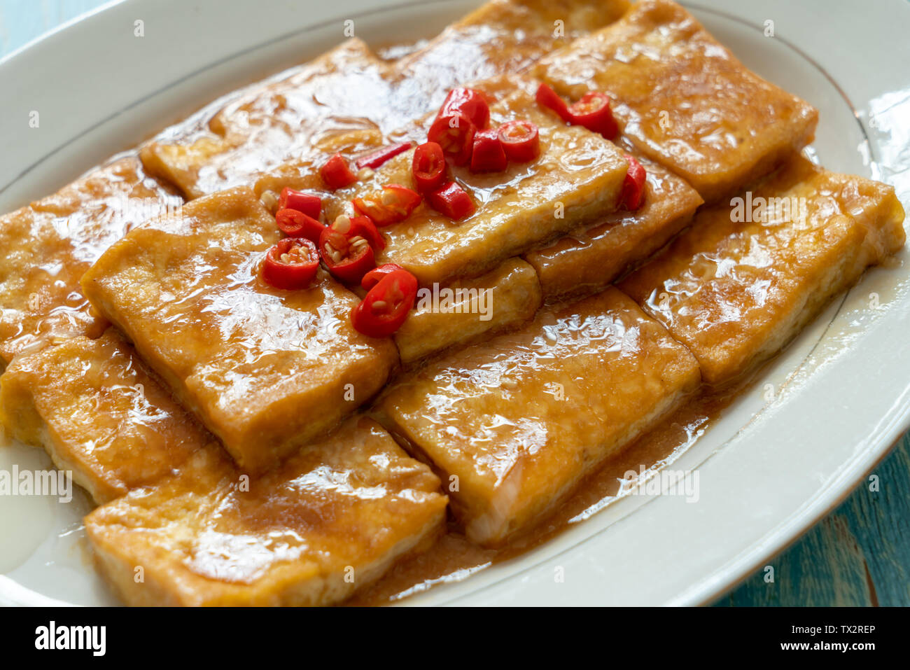 Home-cooked fried tofu Stock Photo - Alamy