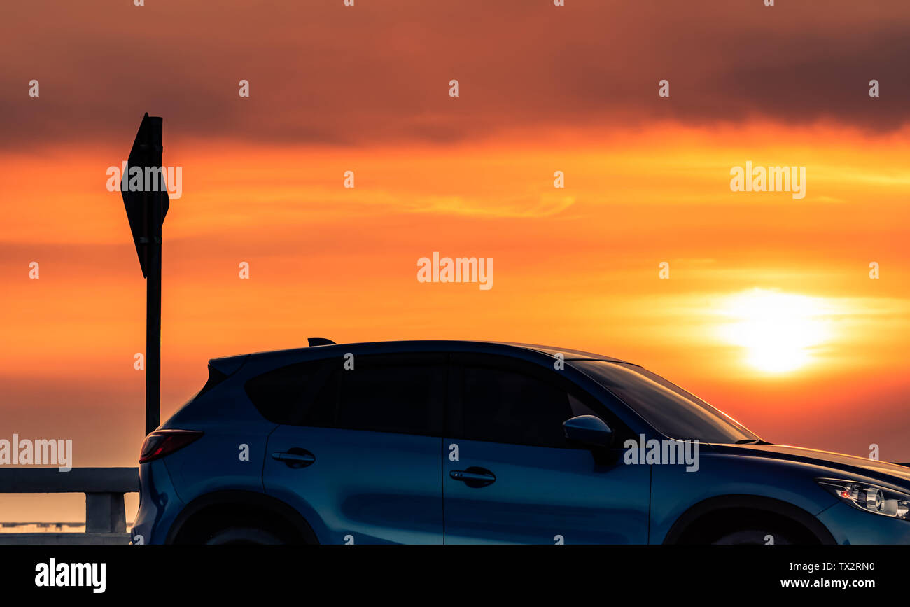 Side view of blue SUV car with sport and modern design parked on ...