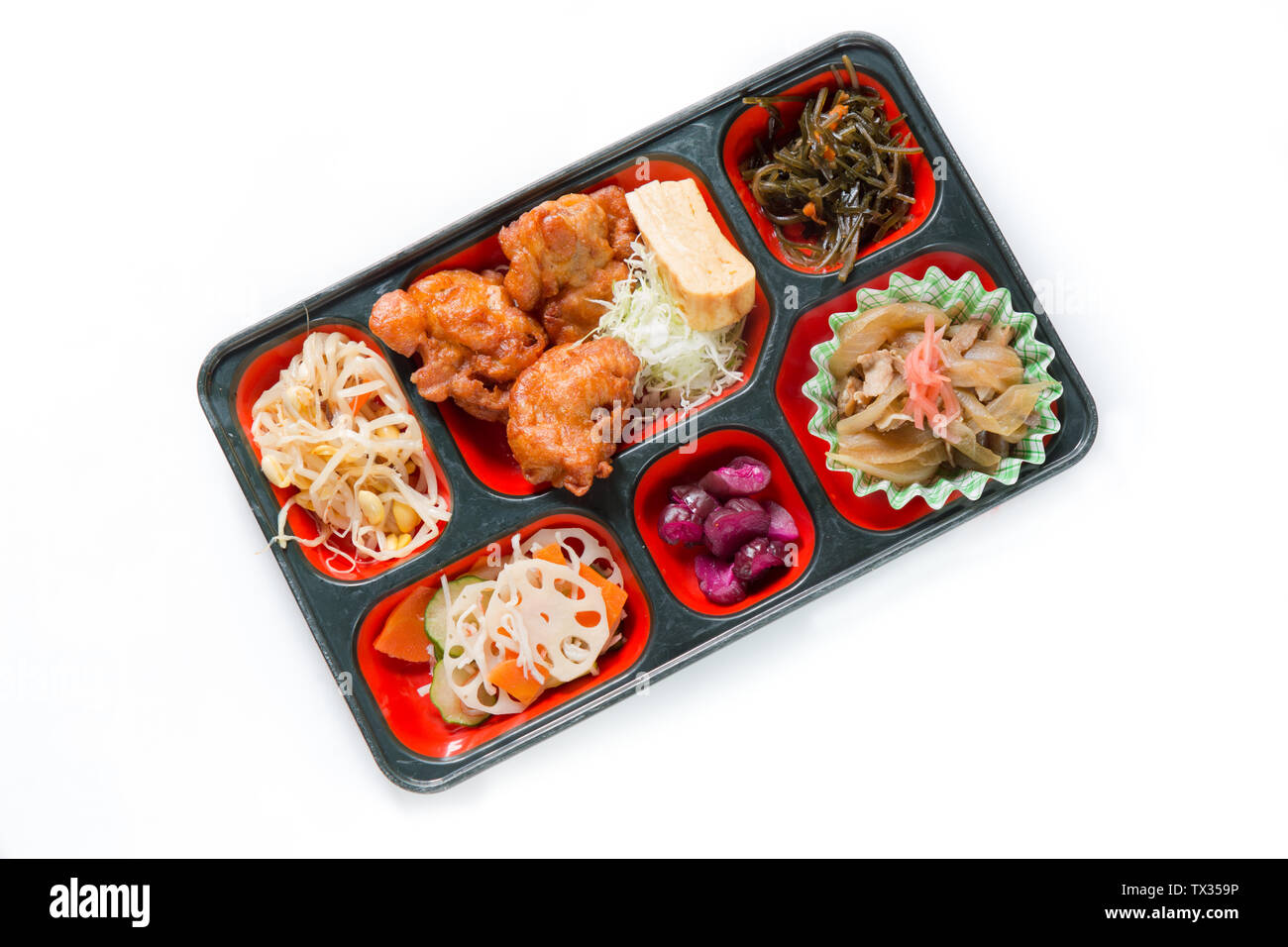 Japan Food set of chicken fried and other in a box isolated on white ...