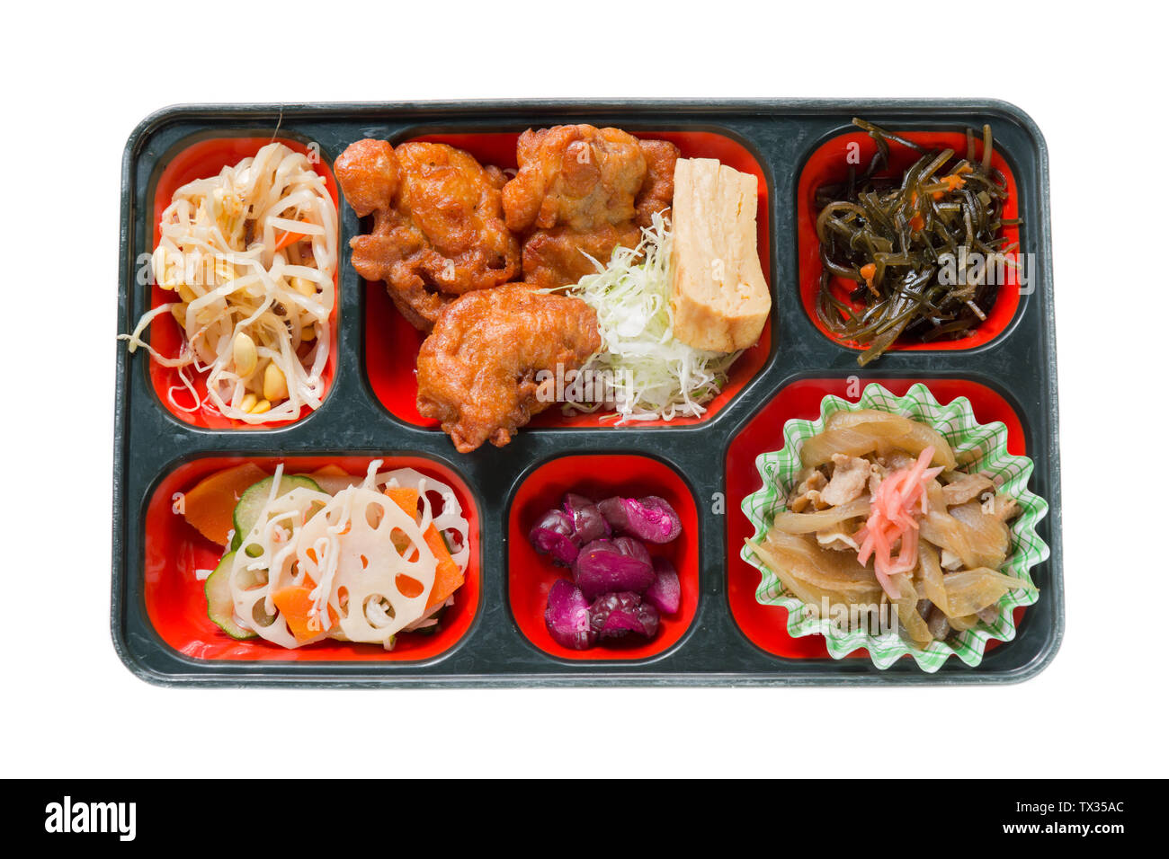 Japan Food set of chicken fried and other in a box isolated on white ...