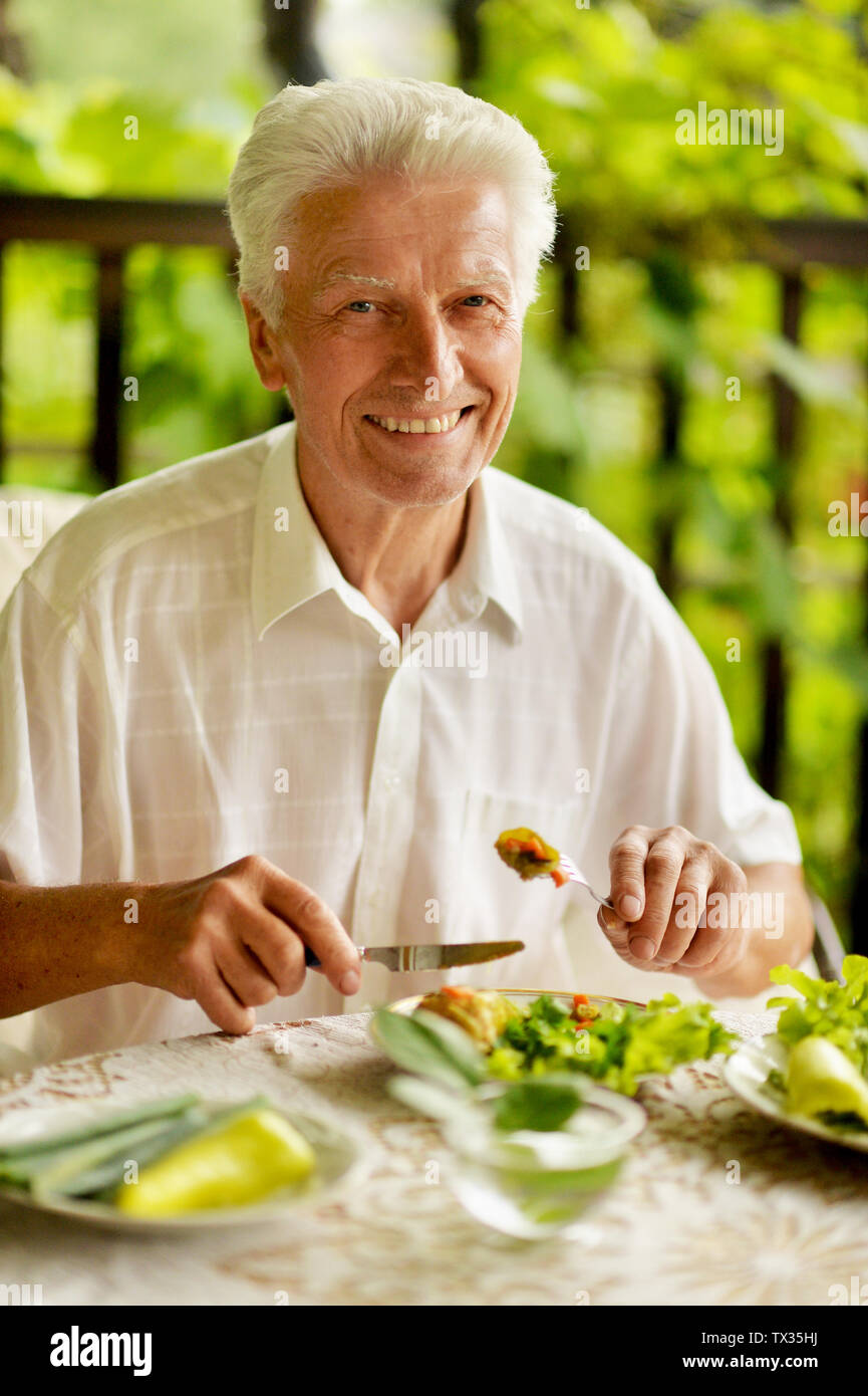 Man eating salad handsome hi-res stock photography and images - Alamy