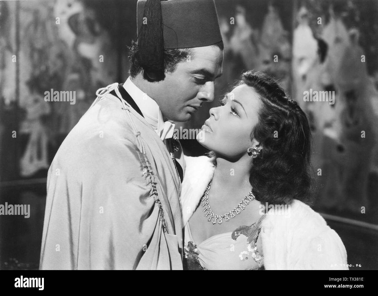 GENE TIERNEY as Poppy and VICTOR MATURE Doctor Omar in THE SHANGHAI ...