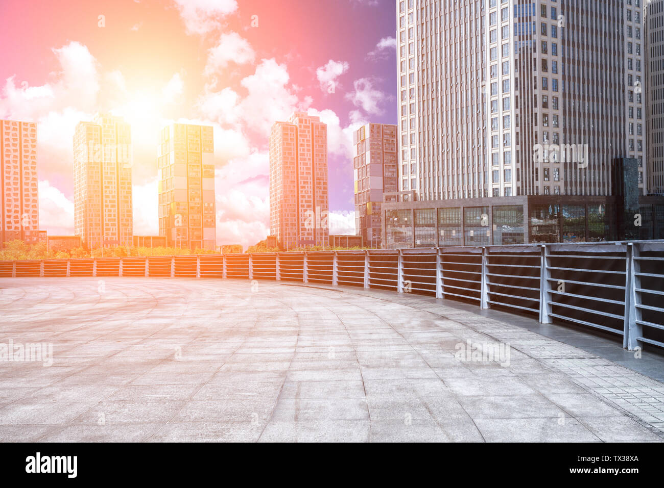 Towering urban architecture with curved viewing platform Stock Photo ...