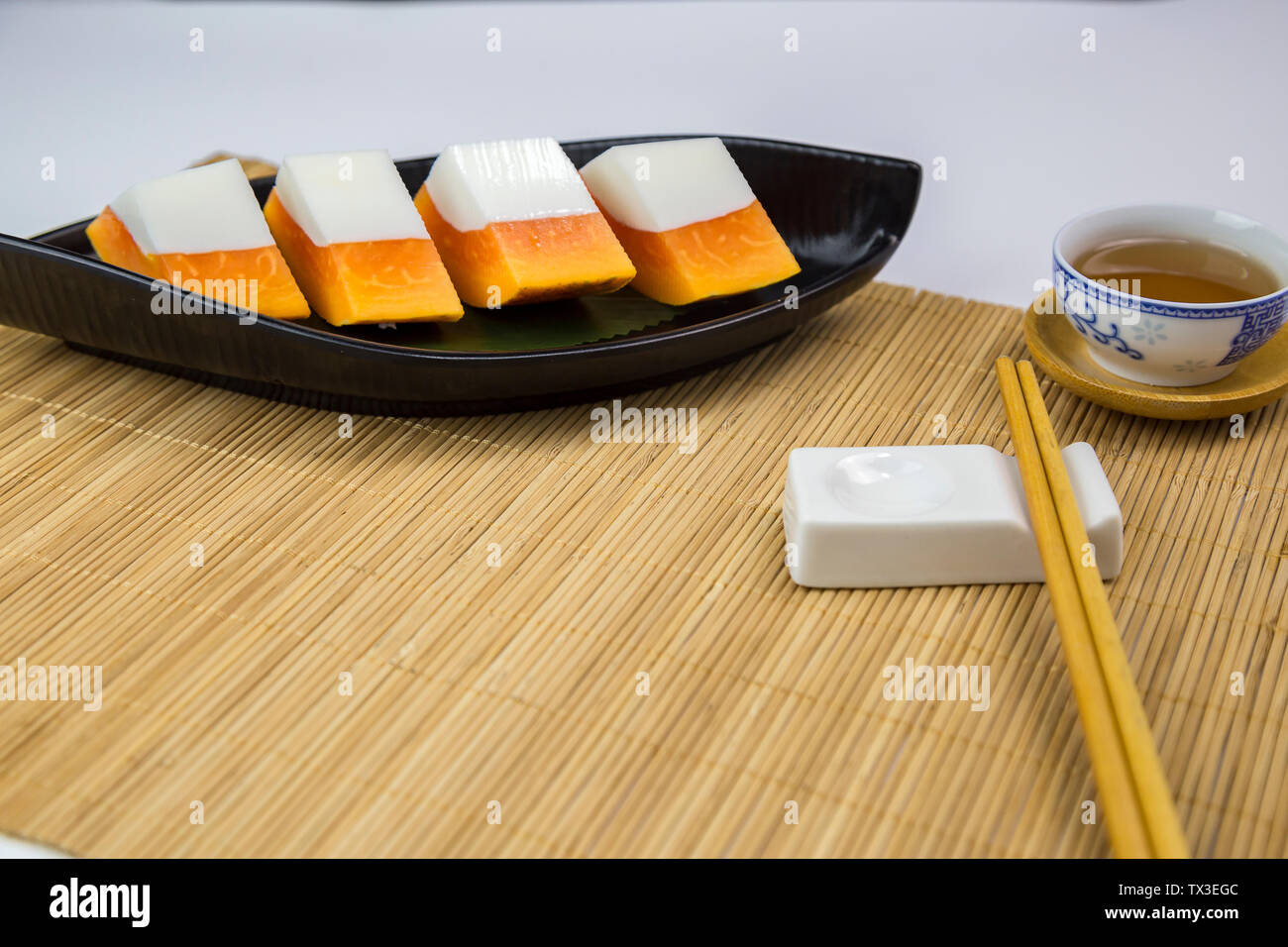 Chinese dim sum cuisine, coconut milk papaya frozen Stock Photo - Alamy