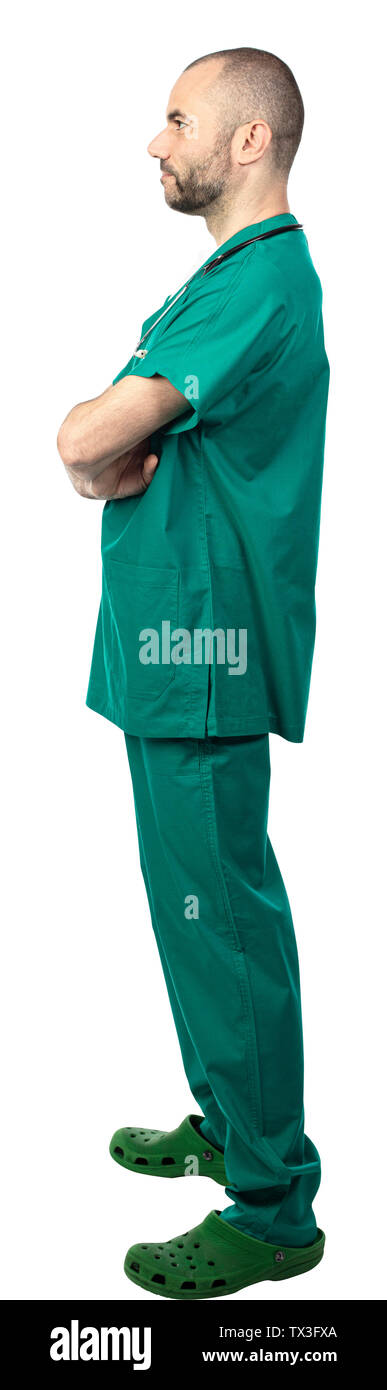 standing doctor with green uniform, crossed arms side view, isolated on ...