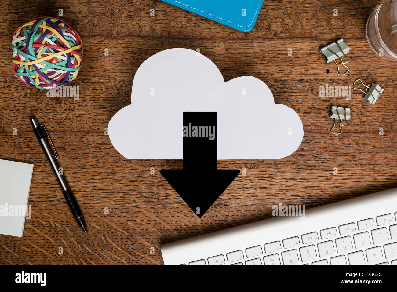 View from above paper cloud and arrow on wooden desk Stock Photo - Alamy