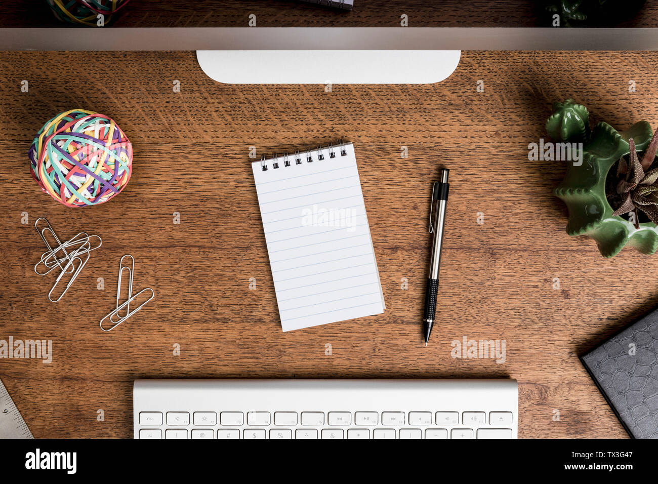 View from above blank notepad in front of desk Stock Photo - Alamy