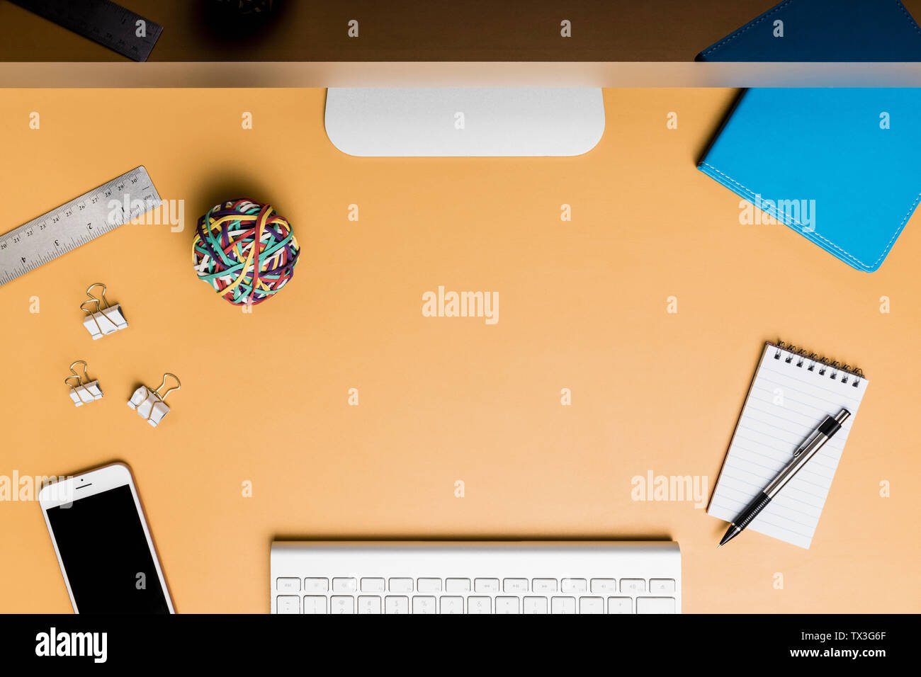 View from above computer and office supplies on desk Stock Photo - Alamy