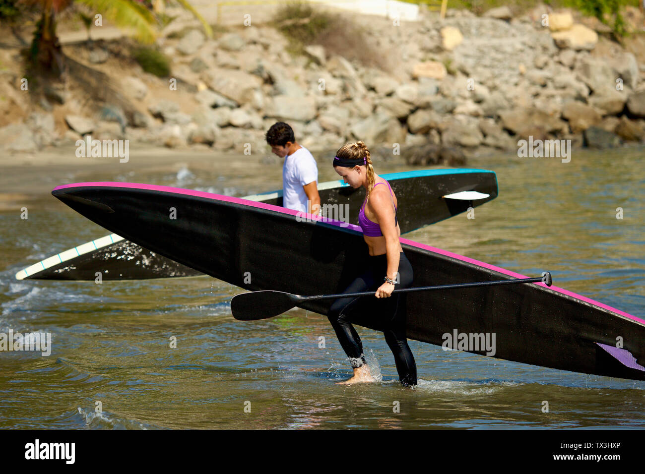 Two men wading in sea hi-res stock photography and images - Alamy