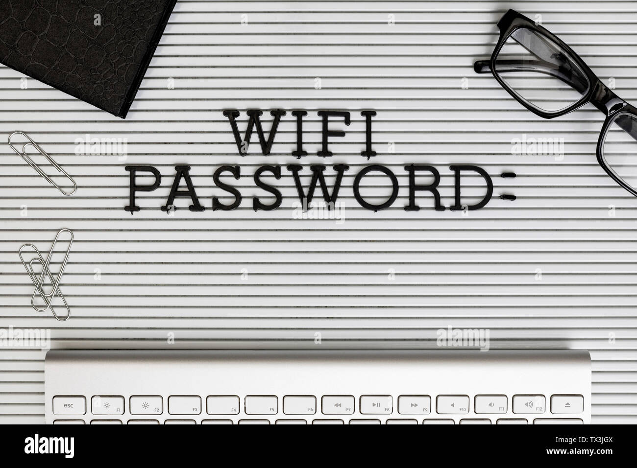 View form above "Wifi Password" on desk above computer keyboard Stock ...