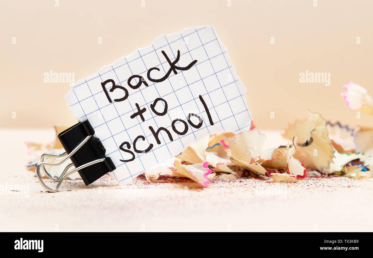 Back to school inscription on paper and pencil shavings Stock Photo - Alamy