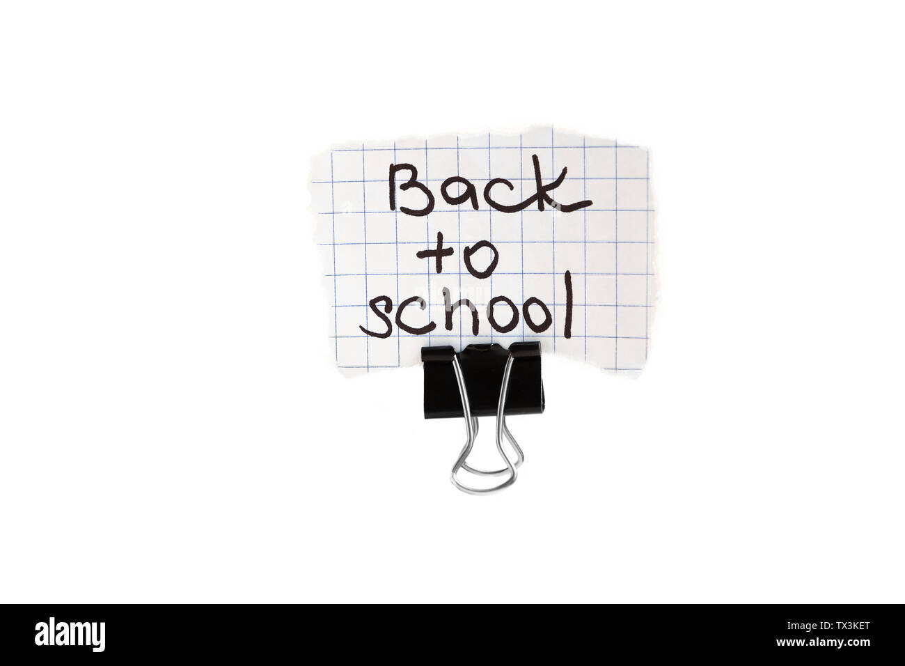 Back to school inscription on paper on white background Stock Photo - Alamy