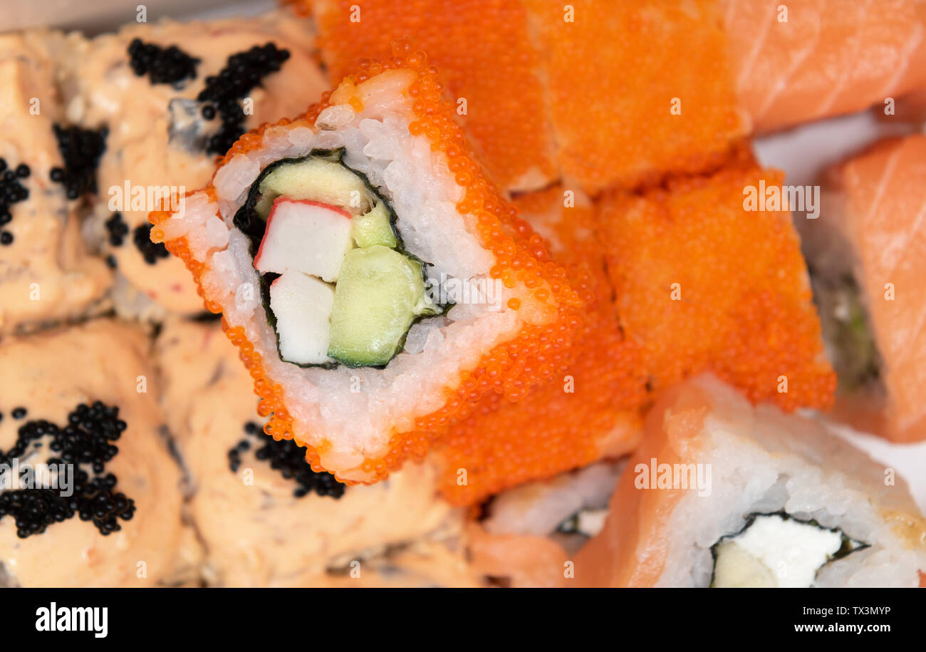 Japanese cuisine. Maki sushi with fresh ingredients Stock Photo - Alamy
