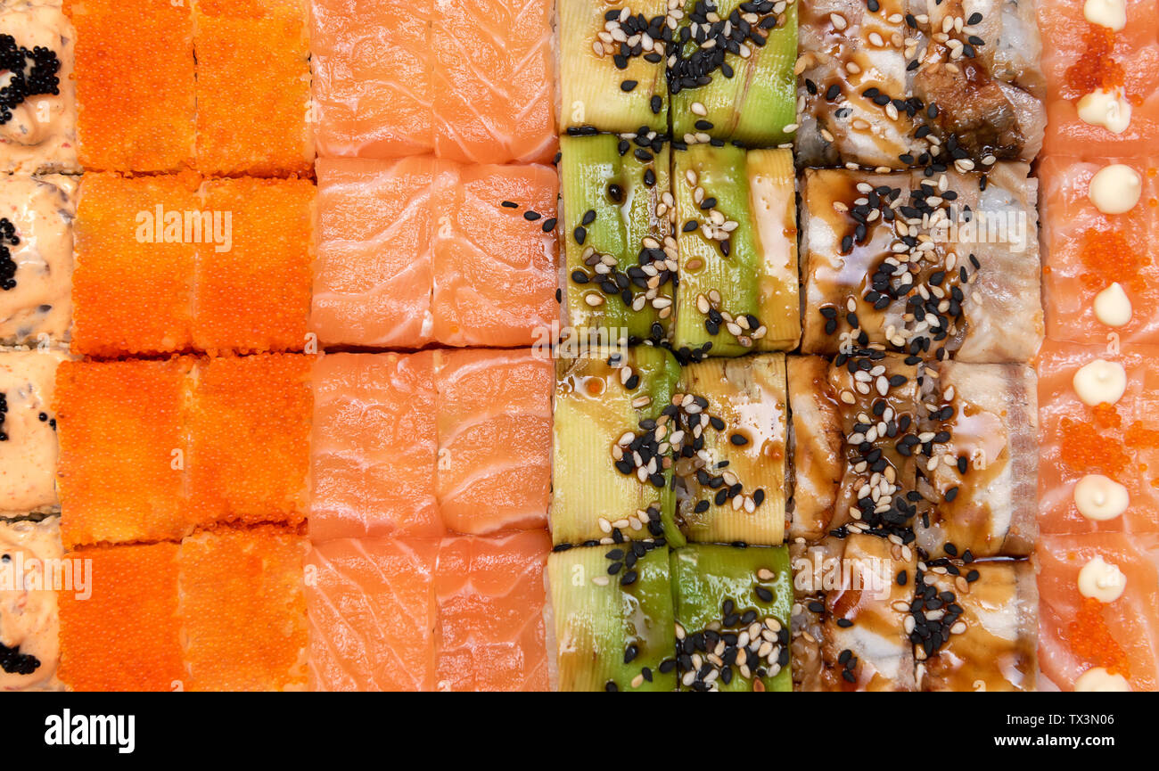 Japanese cuisine. Maki sushi with fresh ingredients Stock Photo - Alamy