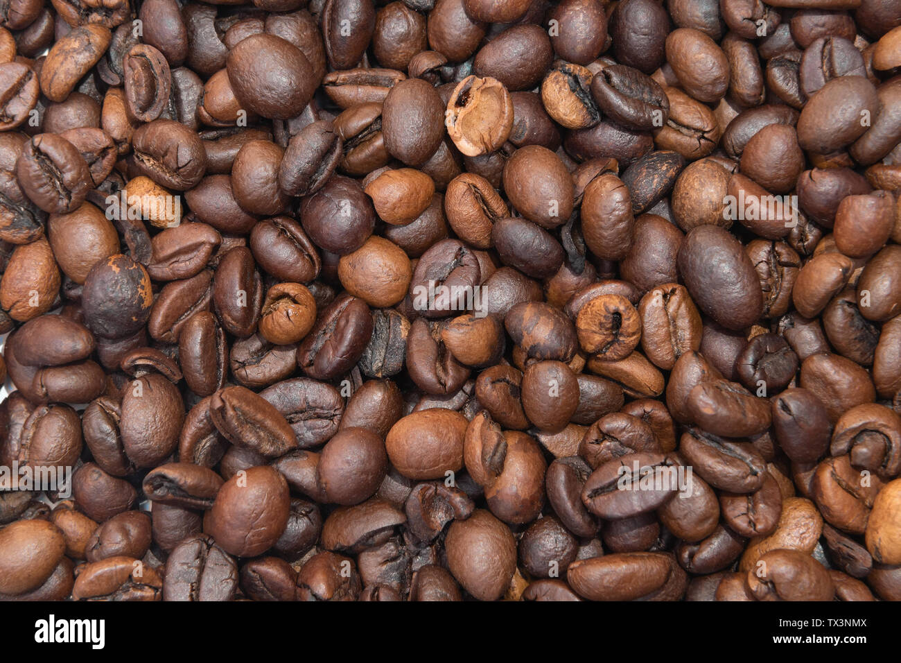 Coffee beans as abackground, close up Stock Photo - Alamy