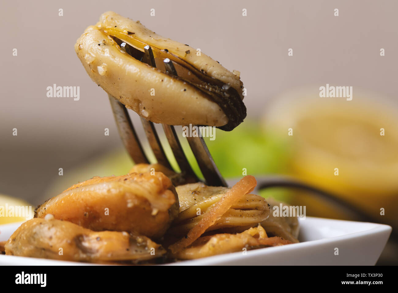 Pickled mussels with carrot, lemon juice and oil Stock Photo - Alamy