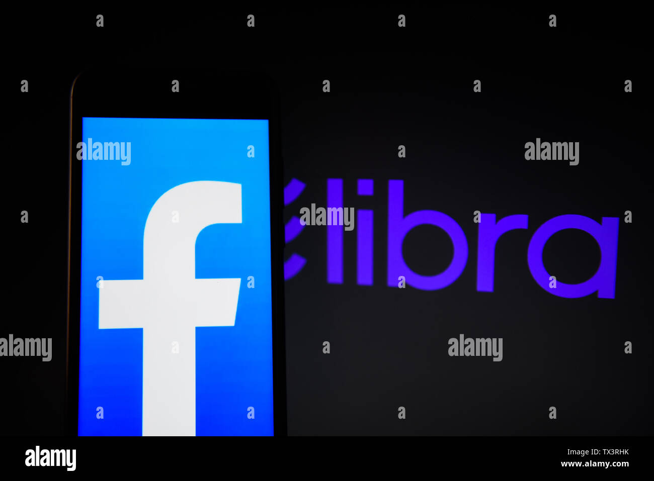 In this photo illustration a facebook logo seen displayed on a ...