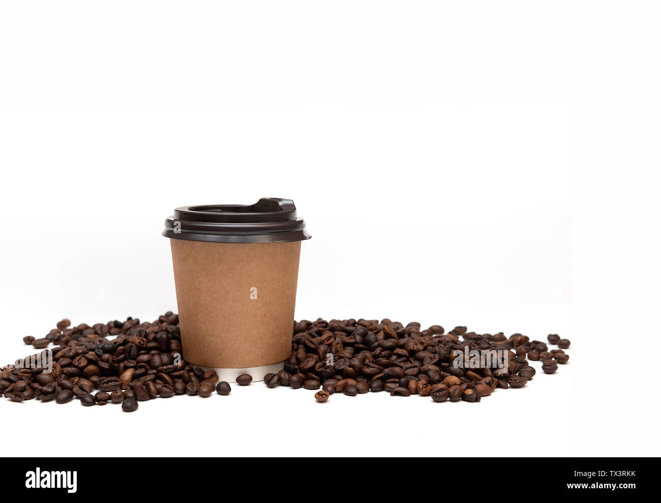 Paper cup with coffee beans isolated on white background Stock Photo ...
