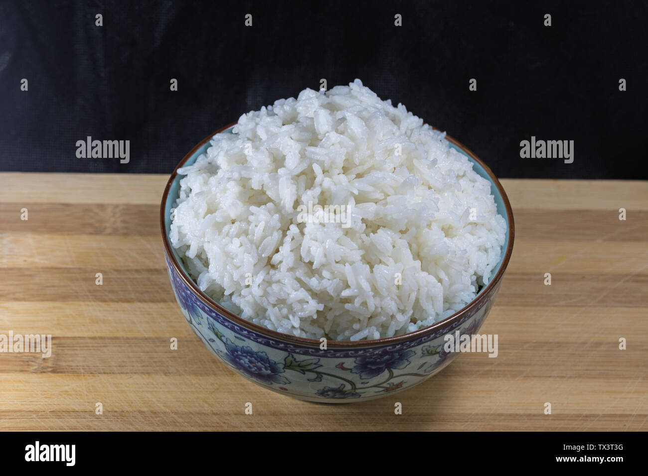 A bowl of white rice Stock Photo - Alamy