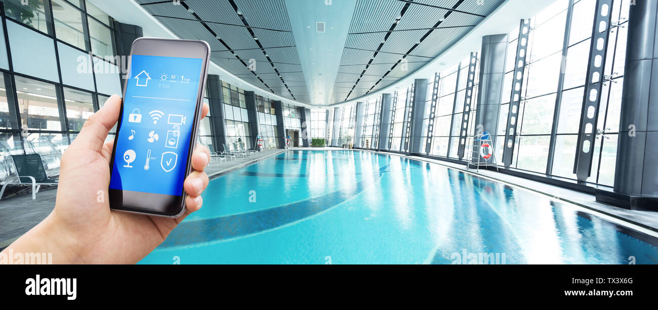 smart phone with smart home with modern swimming pool Stock Photo - Alamy