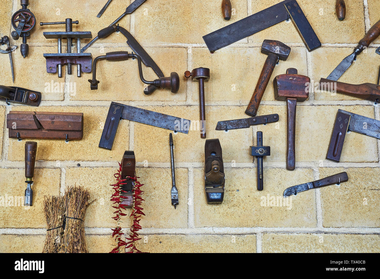 Tools and craft objects displayed as an ornament Stock Photo - Alamy