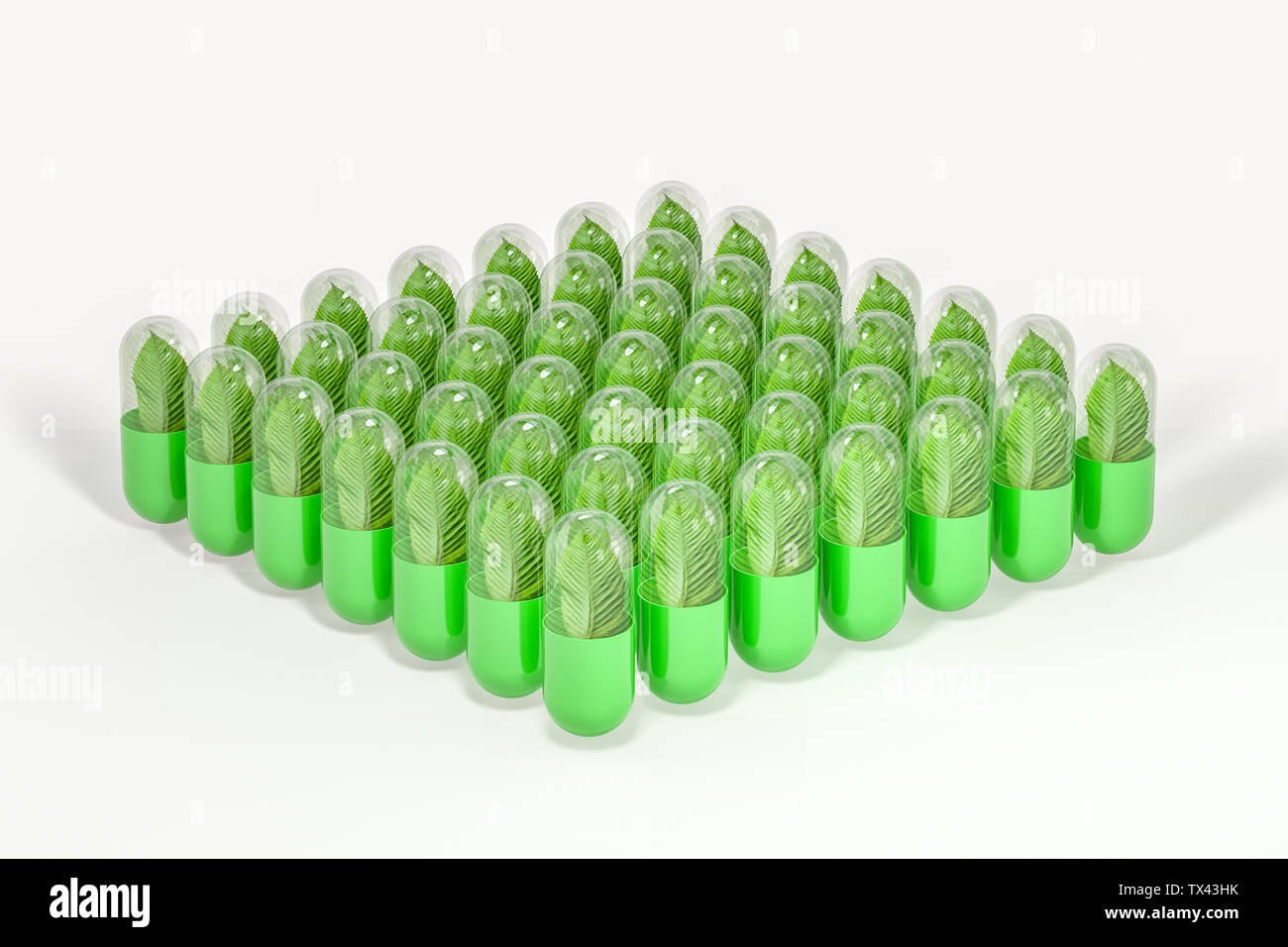 Three dimensional rendering, green capsule with pure white background ...