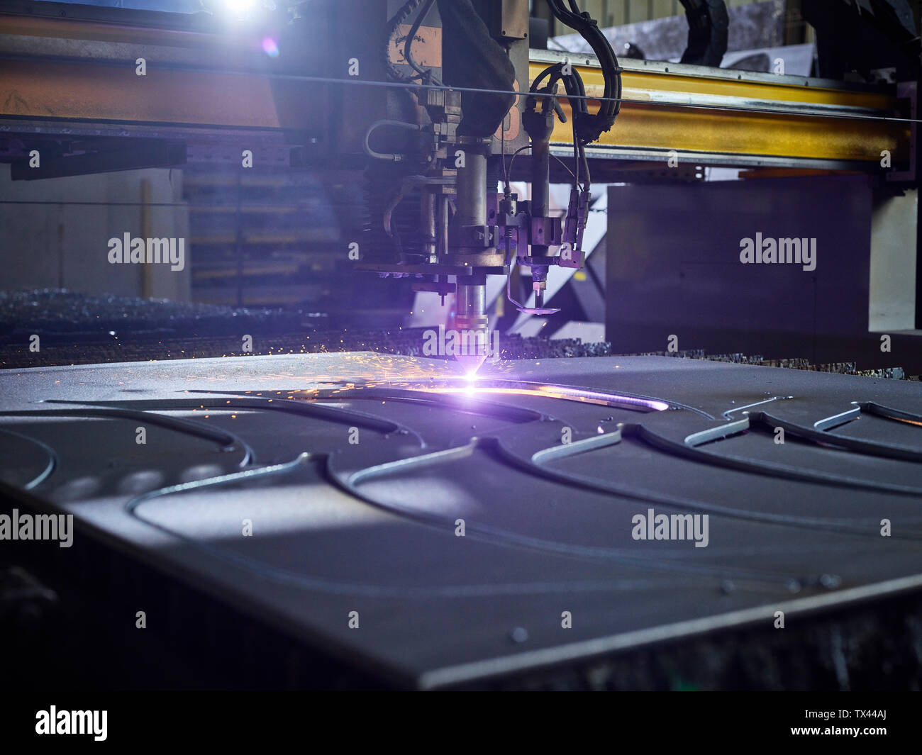 Laser cutter in modern factory Stock Photo - Alamy