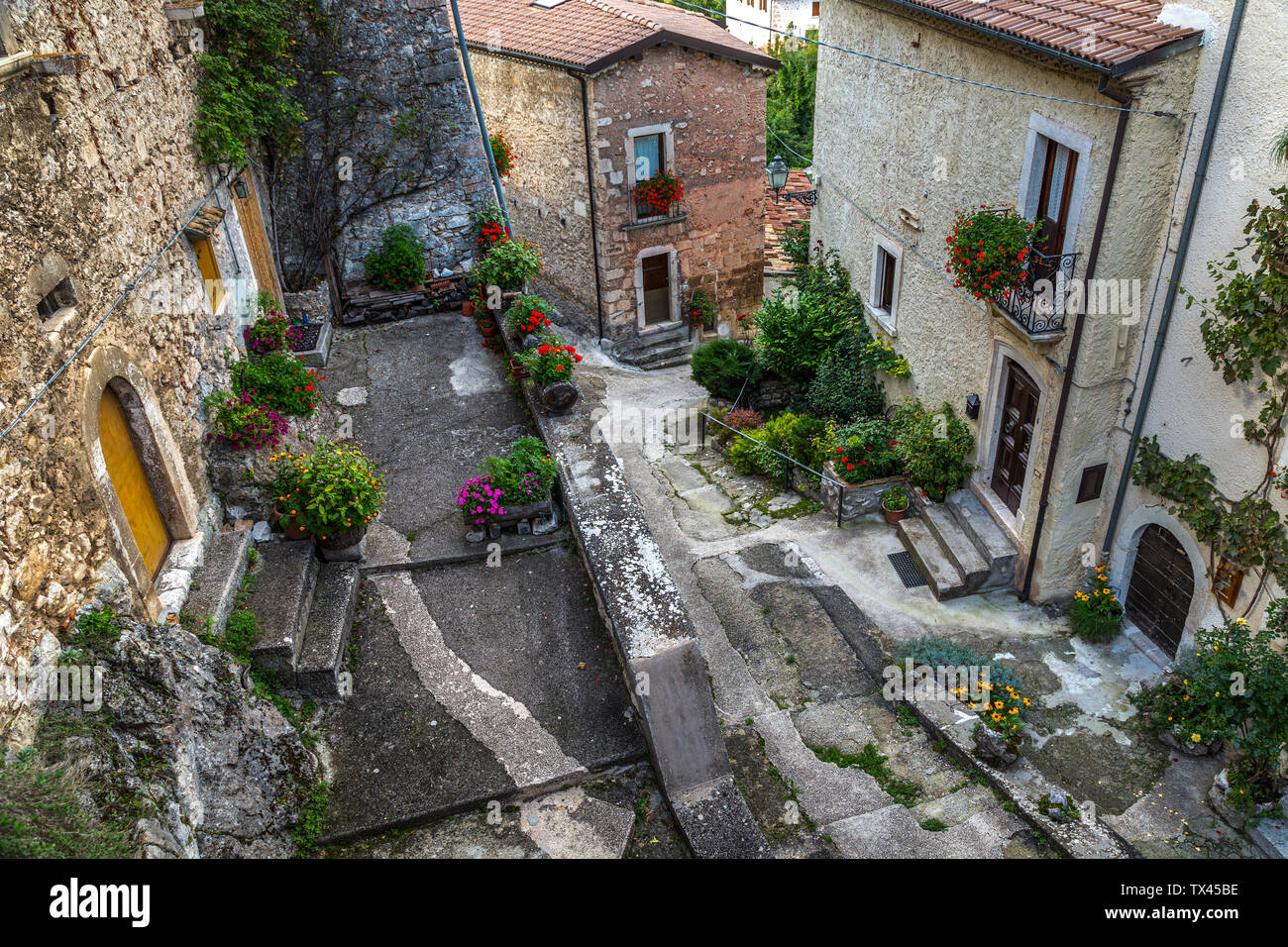 Downhill alley of a mountain village Stock Photo - Alamy