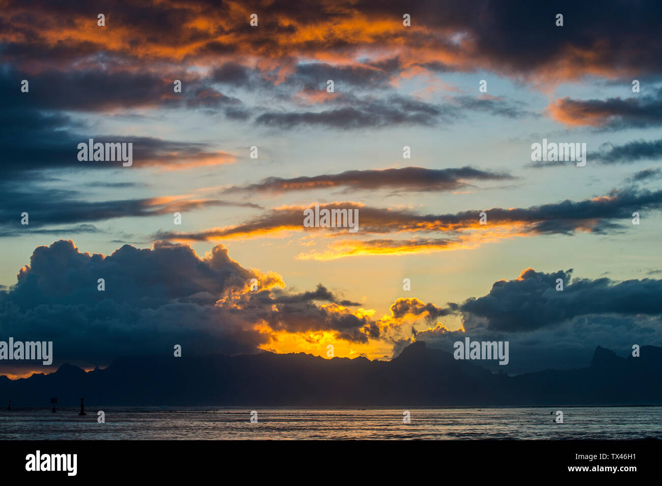 French Polynesia, Tahiti, dramatic sunset over Moorea Stock Photo - Alamy
