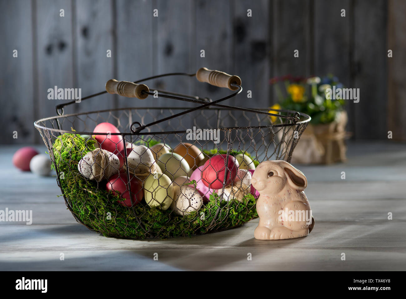 Easter bunny in basket hi-res stock photography and images - Alamy