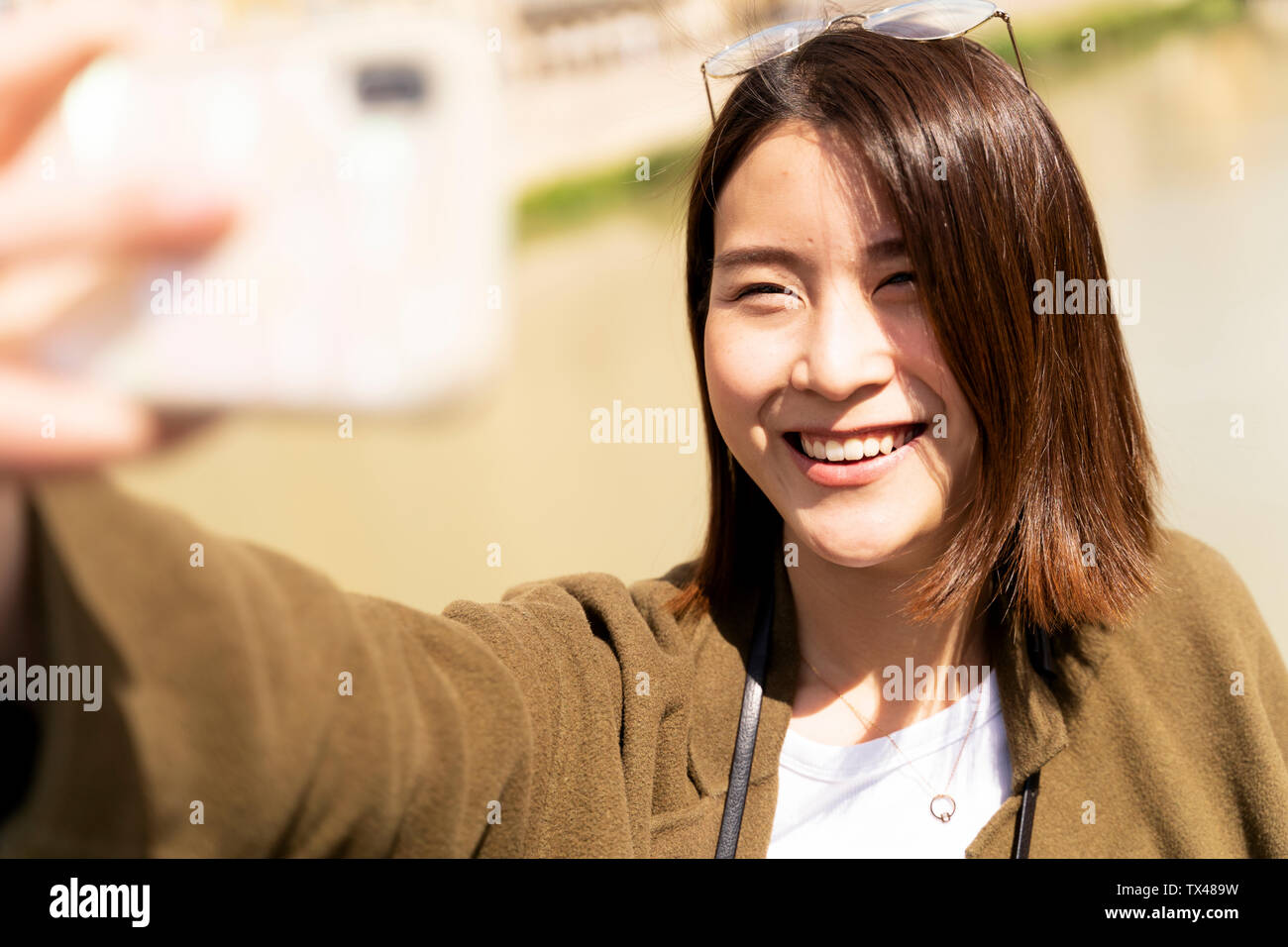 Asian woman taking a selfie hi-res stock photography and images - Alamy