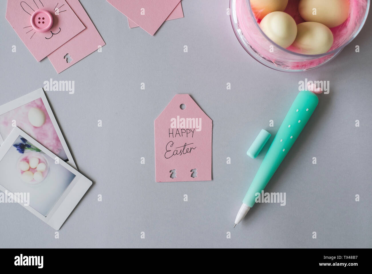 Pink Easter Gift tag on the desk from above Stock Photo - Alamy