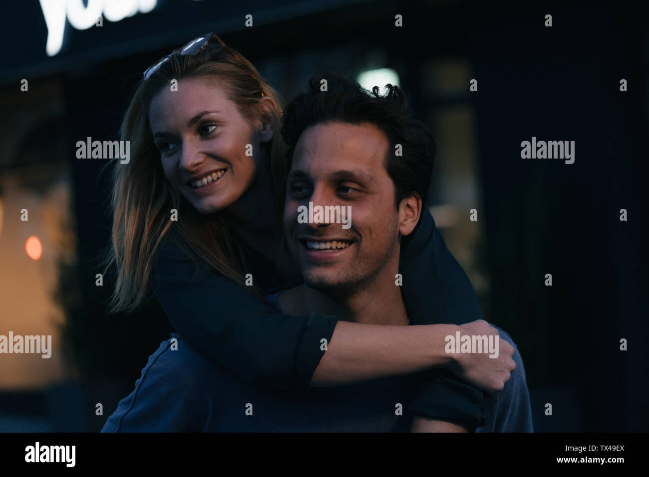 Couple happy night hugging hi-res stock photography and images - Alamy