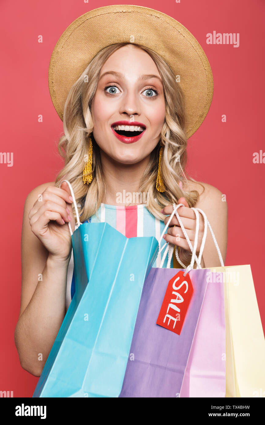 Image of a beautiful shocked excited amazing young woman posing ...