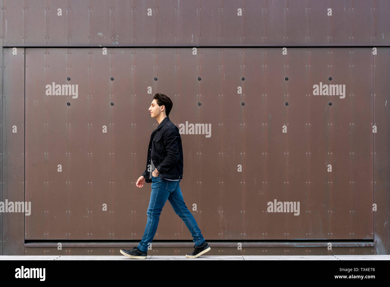 Man walking side view jacket hi-res stock photography and images - Alamy