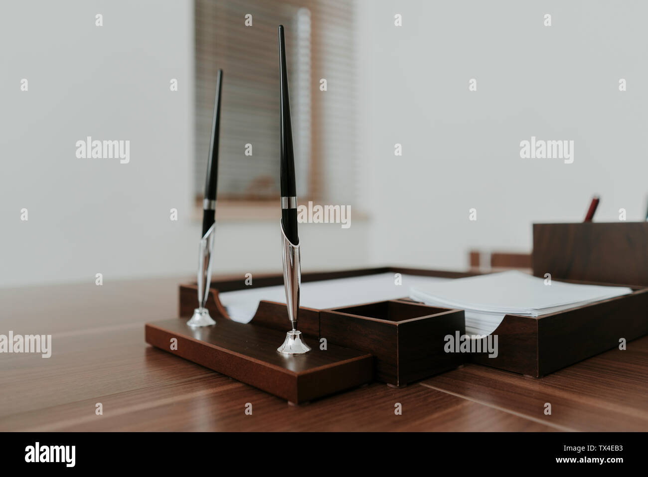 Neat wooden desk in office Stock Photo - Alamy