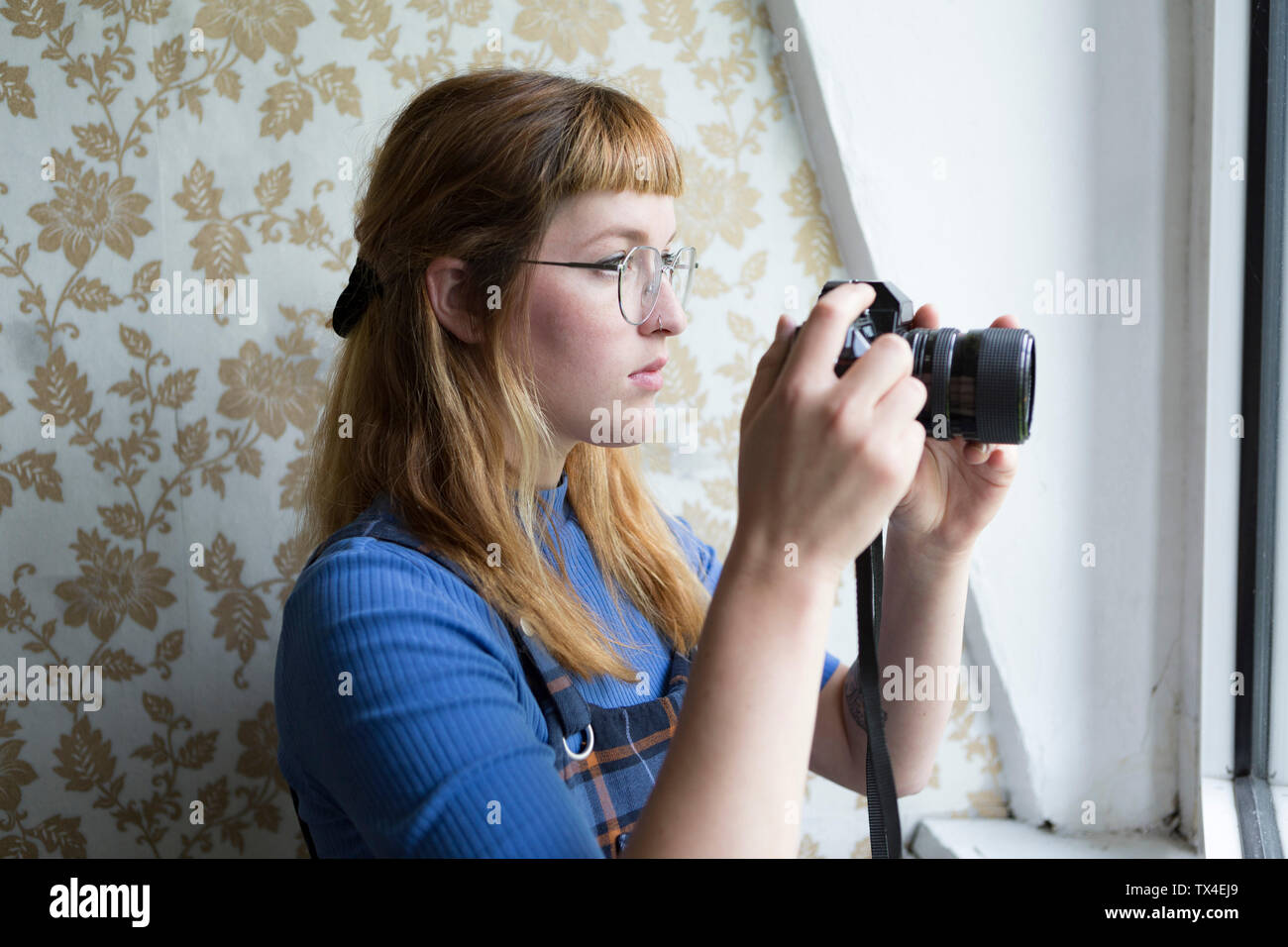 Female student using camera Stock Photo - Alamy