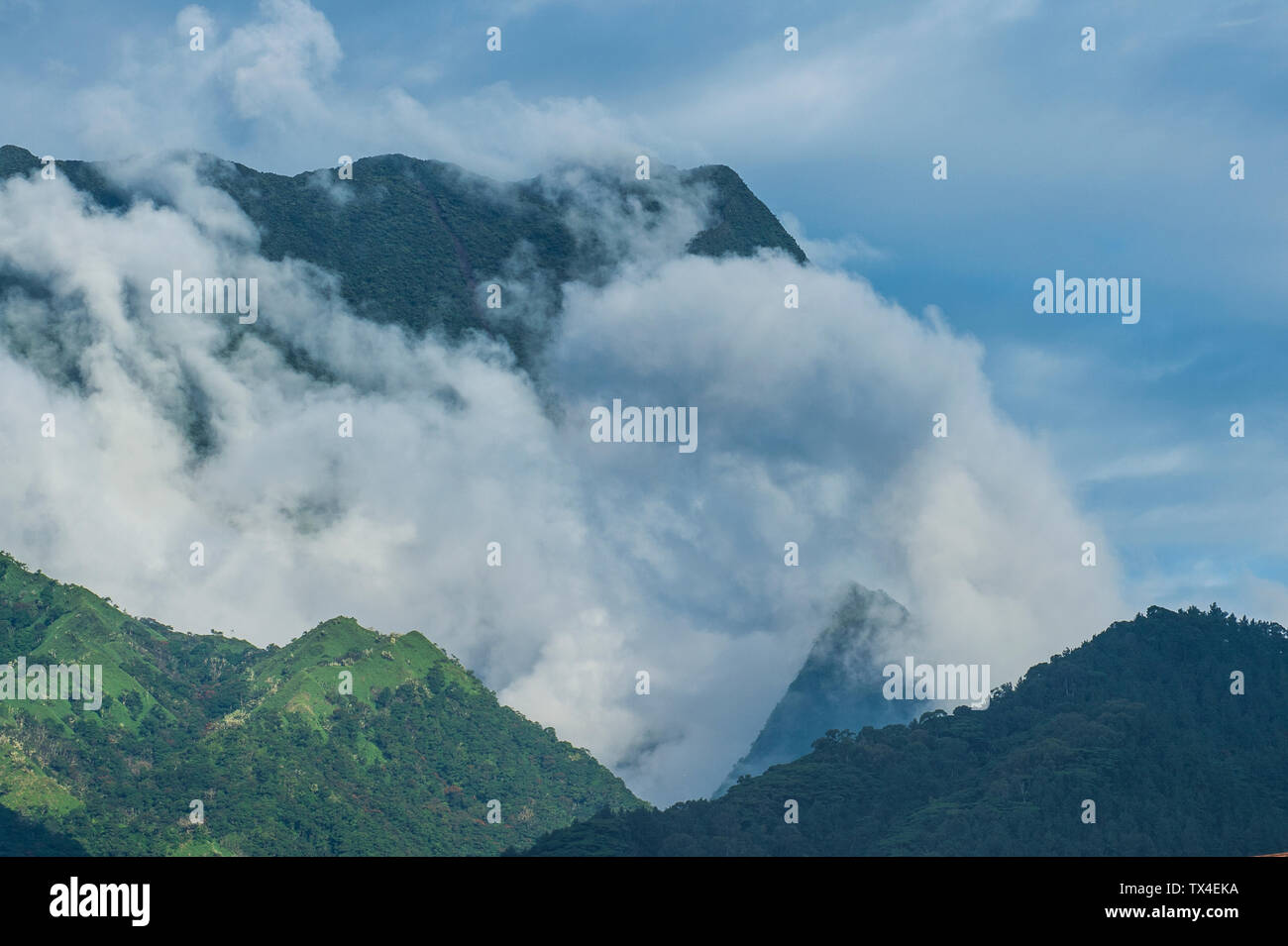 French Polynesia, Tahiti, dramatic mountains looming behind Papeete ...