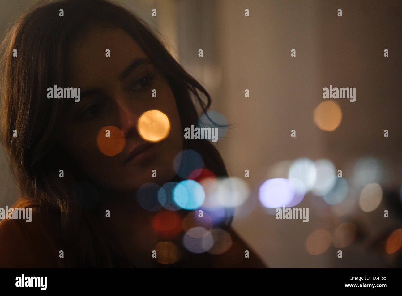 Woman behind window night hi-res stock photography and images - Alamy