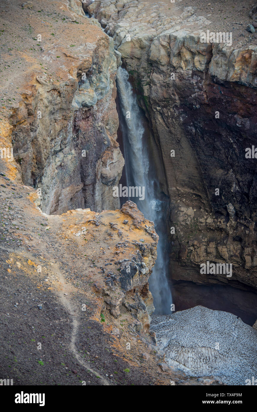 Russia, Kamchatka, half frozen waterfall below Mutnovsky volcano Stock ...