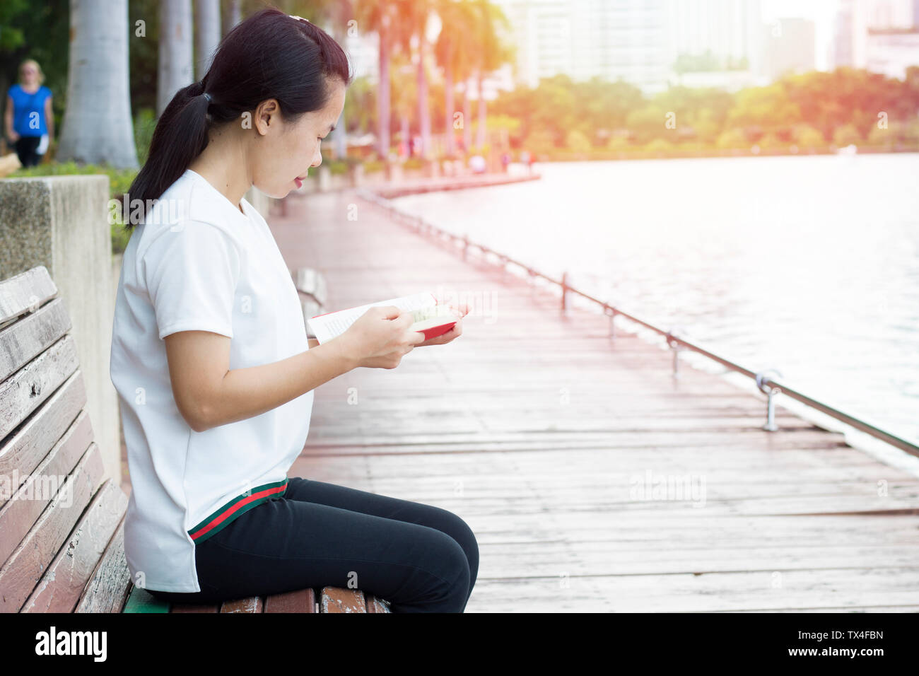 Student reading by the river hi-res stock photography and images - Alamy
