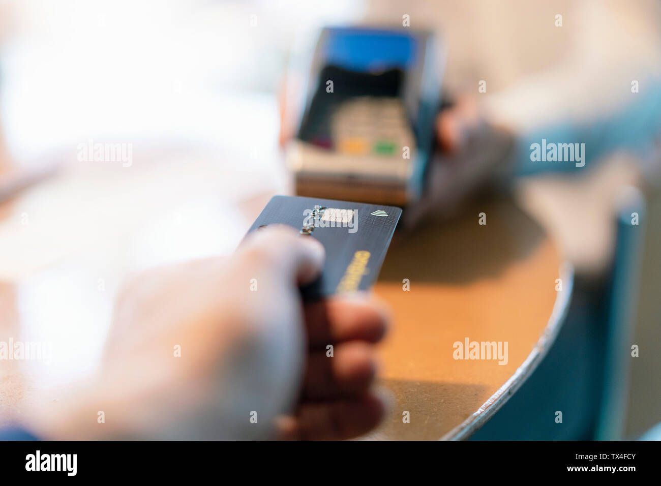 Mature man using debit card hi-res stock photography and images - Alamy